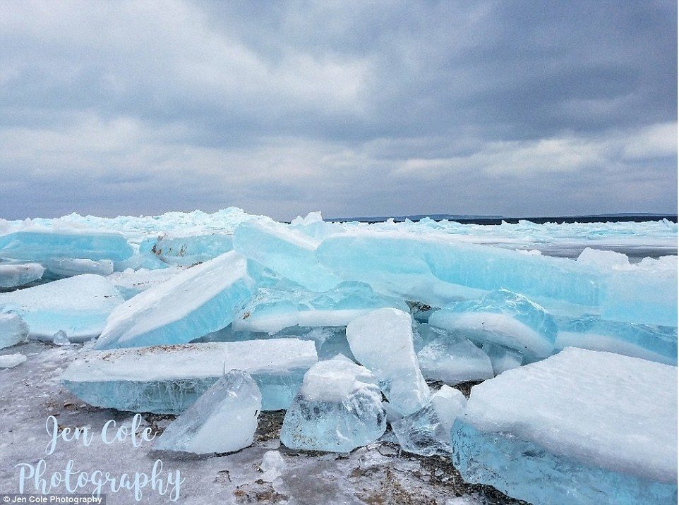 Stacks of rare blue ice form 30ft high on shores of the Great Lakes ...