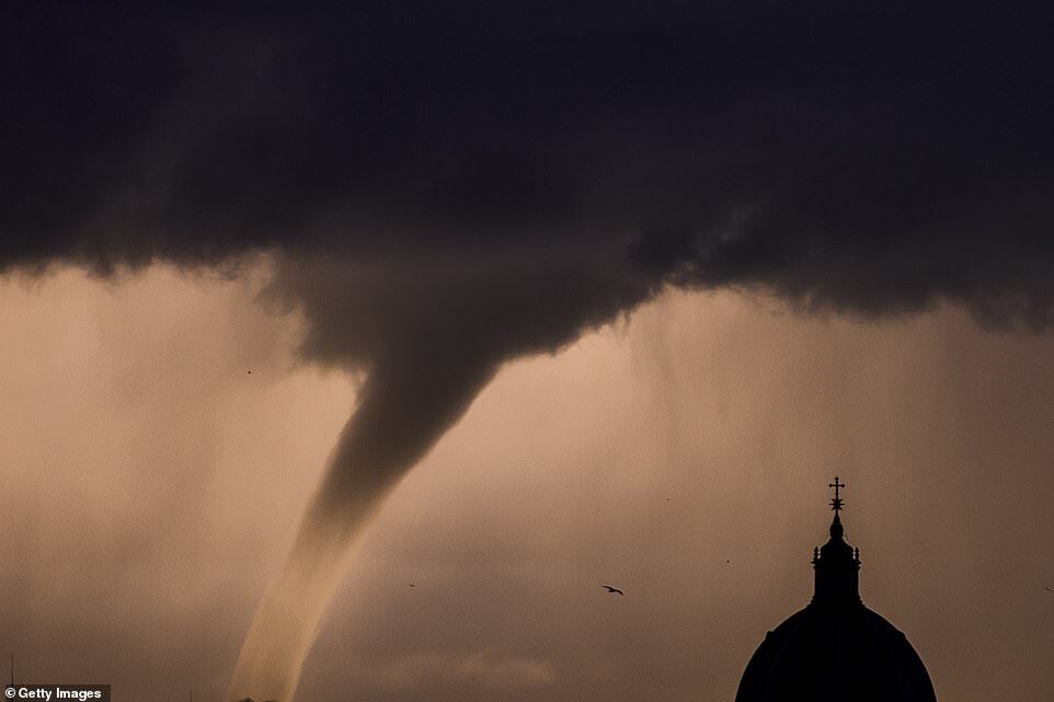 What in the whirled? Romans are captivated as massive waterspout spins ...